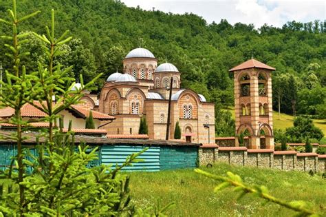 Premium Photo Built Structure By Building Against Trees