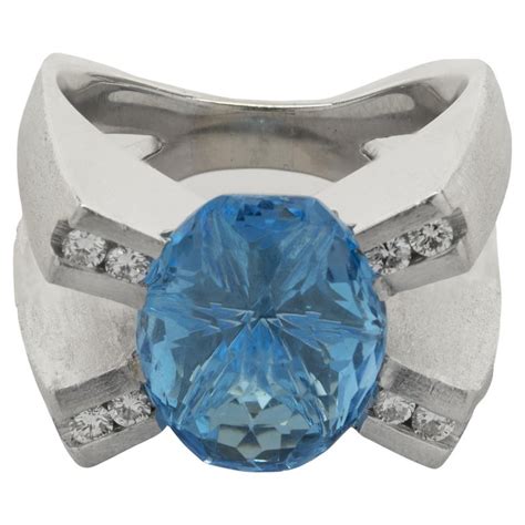 Gauthier 14 Karat White Gold Blue Topaz And Diamond X Ring For Sale At