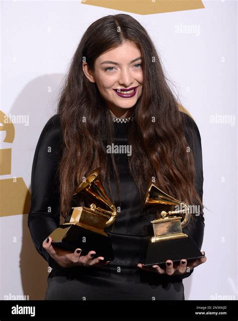 Lorde Poses In The Press Room With The Awards For Best Pop Solo