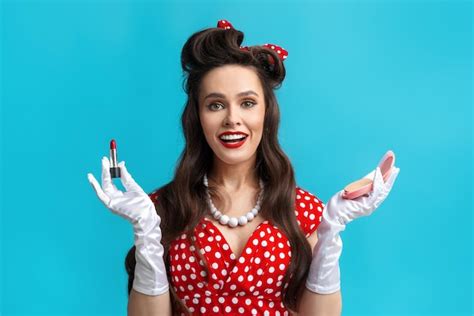 Premium Photo Sensual Young Pinup Woman Holding Bright Lipstick And