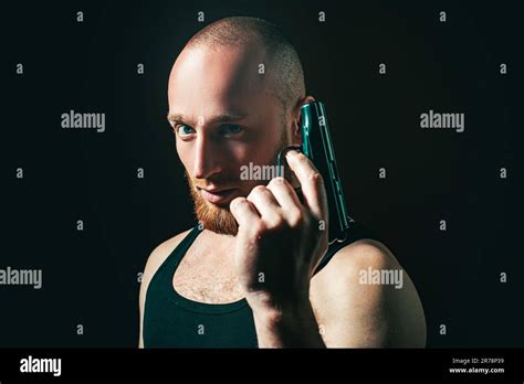 Man Shooting Firearm Handgun Makarov Pistol In A Firing Range
