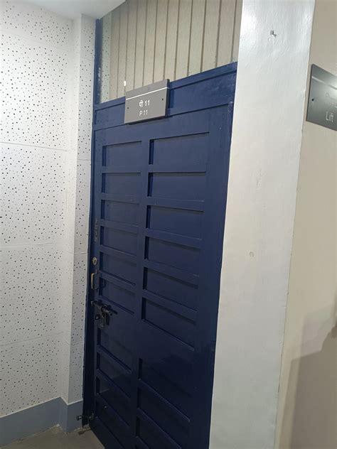 A Closed Classroom Door A Group Of Attendees Outside Asking If They