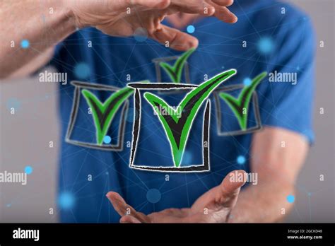 Validation Concept Between Hands Of A Man In Background Stock Photo Alamy