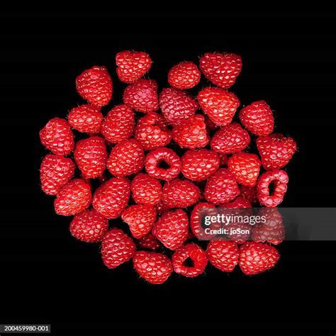 Raspberry Black Background Photos And Premium High Res Pictures Getty