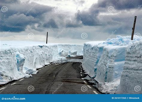 Empty Road Running Between The Masses Of Snow Stock Image Image Of