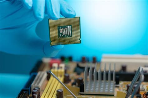 Premium Photo Electronic Engineer Hand Holding Computer Chip Chipset