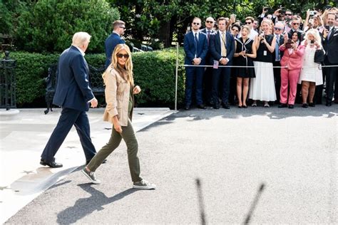Melania Trump Steps Out In Earth Toned Look And An Unexpected Pair Of