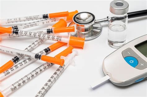 Premium Photo Glucometer And Insulin Syringe Lancing Device Tester