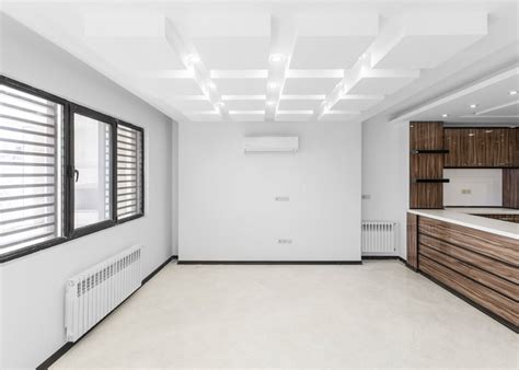 Pale Brickwork Creates Decorative Facade For Iranian Apartment Building