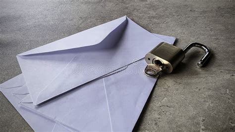 An Open Envelope And Open Metallic Padlock Email Security Concept