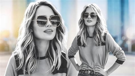 Premium Photo Interested Woman Posing In Sunglasses