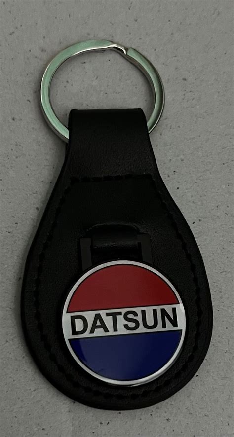 Datsun Round Leather Key Ring All Gassed Up Diecast