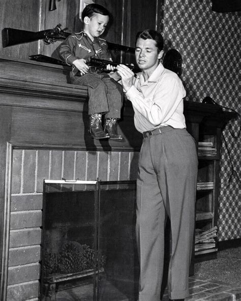 Audie Murphy At Home With His Son And Gun Collection 8x10 Inch Photo Moviemarket
