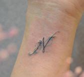N Letter Tattoo Design