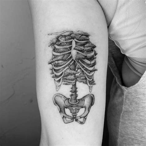 Skeleton Tattoo Located On The Tricep