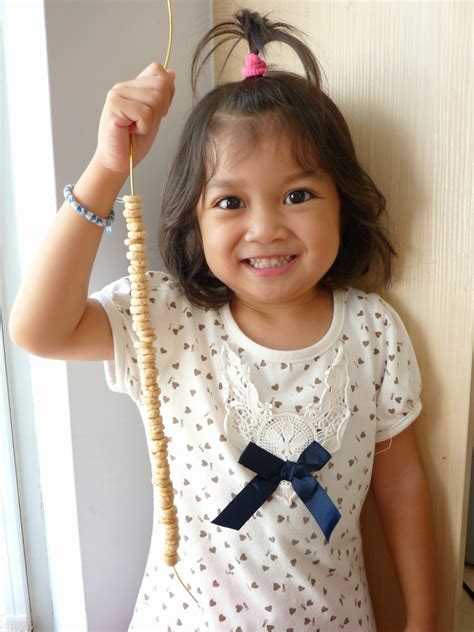 Practical Life Xii Threading Cheerios