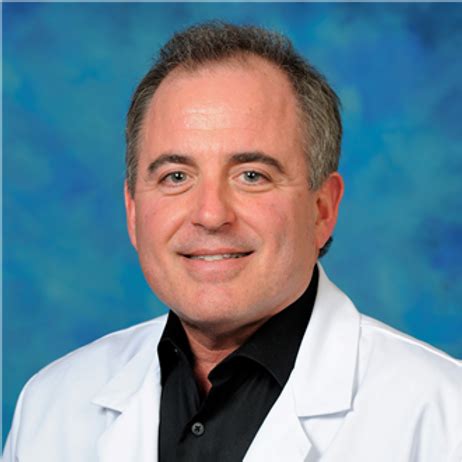 Dr Murray G Goldberg With Palm Beach Gardesn Office