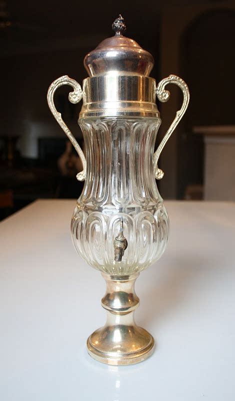 Vintage Glass Beverage Server And A Flower Rashon Carraway