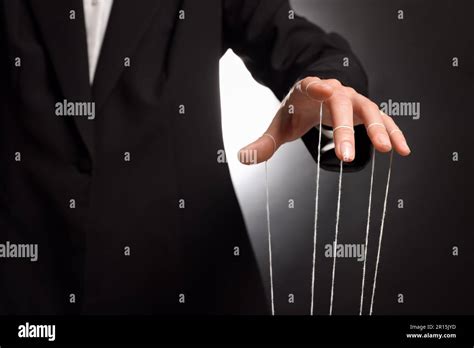 Woman Holding Puppet On String Hi Res Stock Photography And Images Alamy