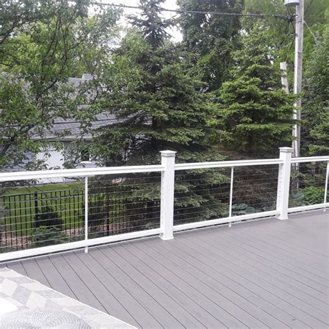 Silver Maple Timbertech Deck With White Rails And Horizontal Cables In