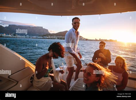 Happy Friends Drinking And Having Fun In Boat Party Young Rich People