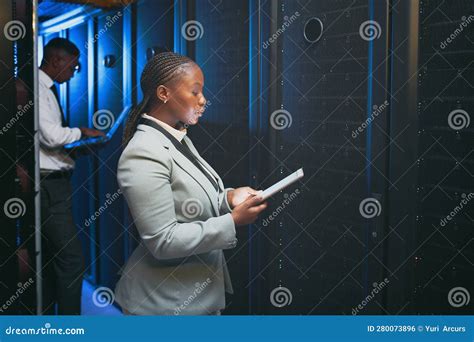 Updating Our Security System Two Young It Specialists Standing Together In The Server Room And