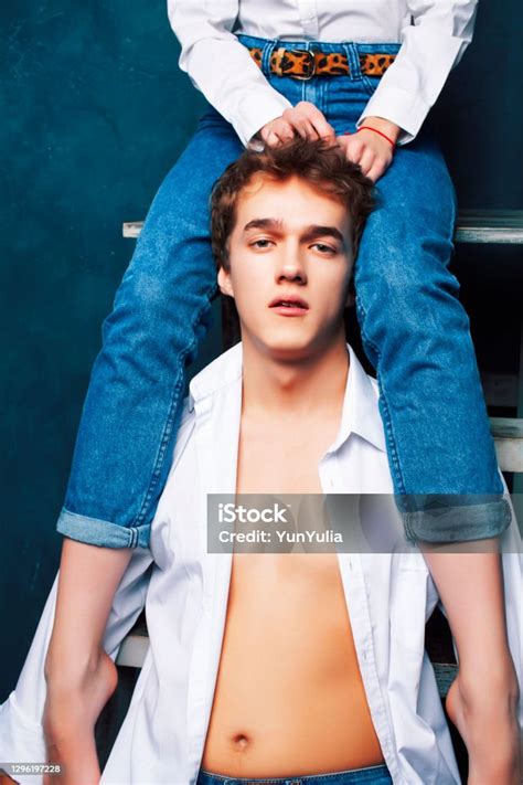 Young Pretty Guy Between Girls Legs Fashion Couple Concept Lifestyle