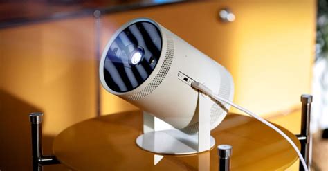 Samsungs Tiny Freestyle Projector Turns Any Wall Into A Big Screen Tv Maxim