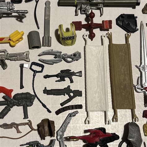 Lot Of Vintage Action Figures Weapons And Accessories Various Toy Lines