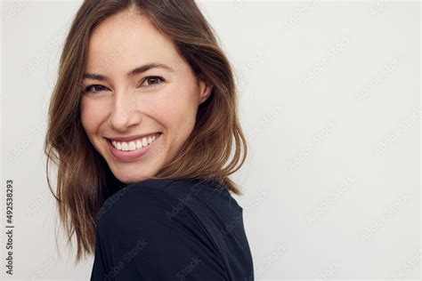 Beautiful Portrait Of Young Happy Woman With A Big Smile On Her Face Looking Cute And Sexy In