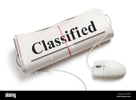 Classified Computer Mouse And Newspaper Roll With White Background
