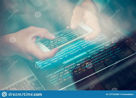 Hacker Using Computer Smartphone And Coding To Steal Password A Stock