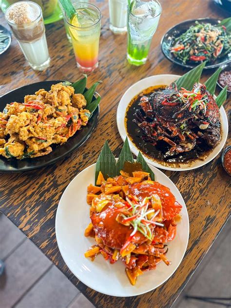 Assorted South East Asian Seafood Delicacies Served On Table Stock