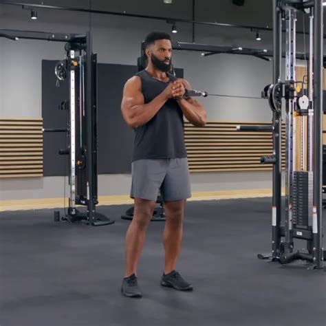 How To Do Standing Elbow To Knee Crunches Video Form Muscles Worked