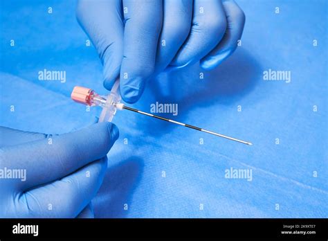 Epidural Anesthesia Needle For Anesthesia In The Hands Of A Medic In Protective Gloves Stock