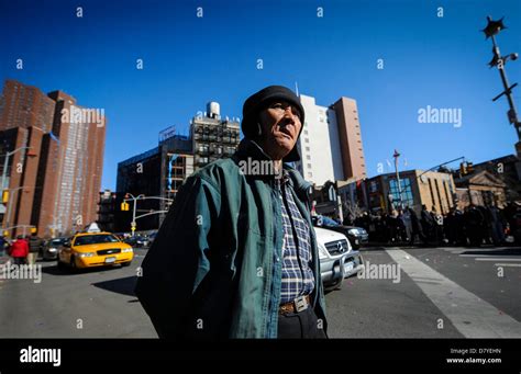 A Candid Street Photograph Of An Elderly Asian Man In Chinatown New