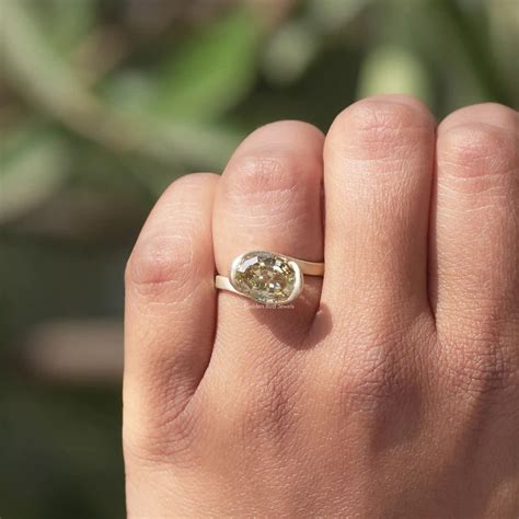 Oval Bypass Solitaire Engagement Ring