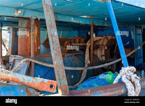 The Covered Deck Of An Old Abandoned Trawler In The Marina At Roccella