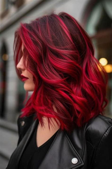 Medium Length Hair With Bright Cherry Red Highlights Is A Hot Trend For