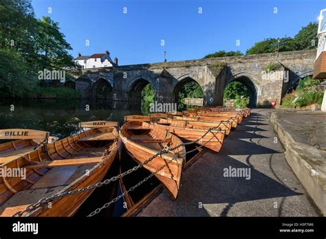 Traditional Hand Built Rowing Boats Are For A Leisurely Row Along The
