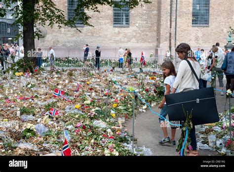 Flowers And Flags To Commemorate The Victims Of The Attacks From 22