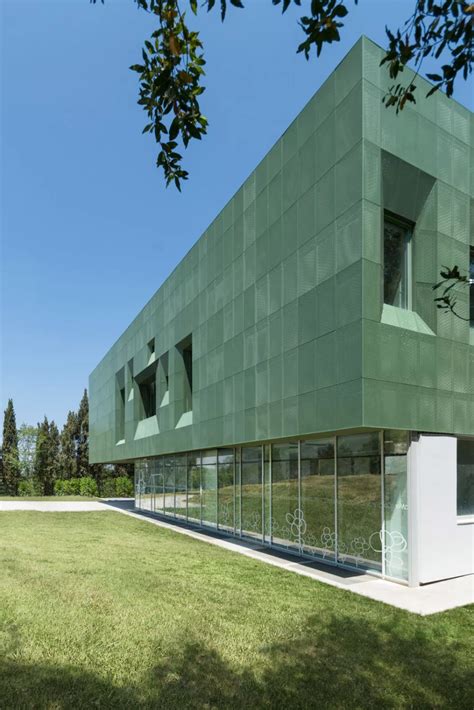 Perforated Green Facade For Calmness