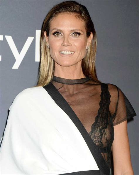 Heidi Klum Single Nipple Peek In Black Bra Pic