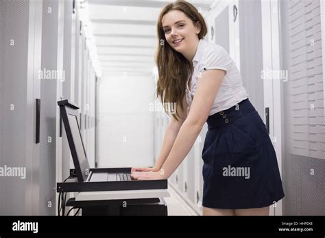 Female Technician Doing Maintenance On Servers In Data Center Stock Photo Alamy