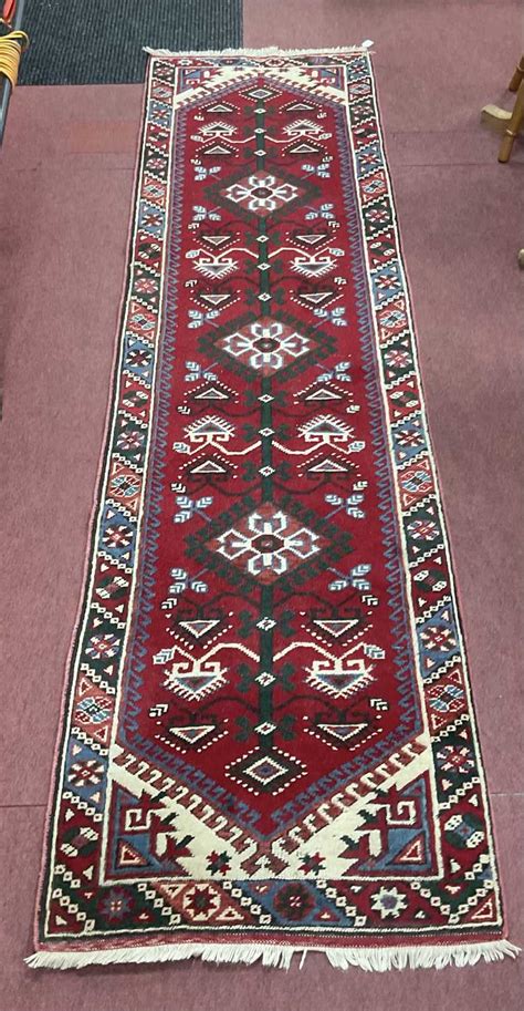 Lot 1566 Middle Eastern Wool Tassled Runner With