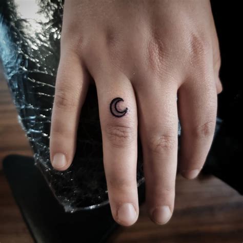 Simple Crescent Moon Finger Tattoo Simple Crescent Moon Finger Tattoo
