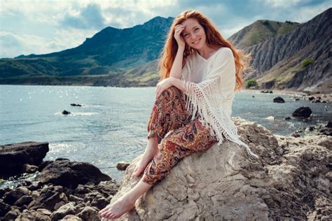 Beautiful Boho Styled Model Wearing White Crochet Swimsuit Posing On
