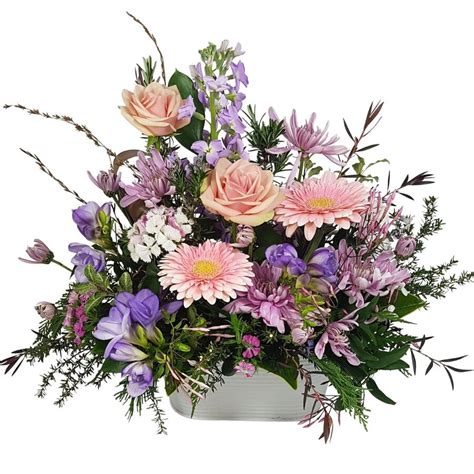 Pastel Garden Arrangement Soft Pinks And Purple Flower Arrangement