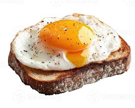 Perfectly Poached Egg With Oozing Yolk On Toasted Bread Garnished With