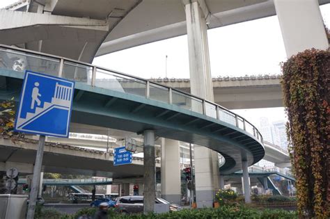 Shanghai Pedestrian Overpass Signage Photo Credit Aaron Paley